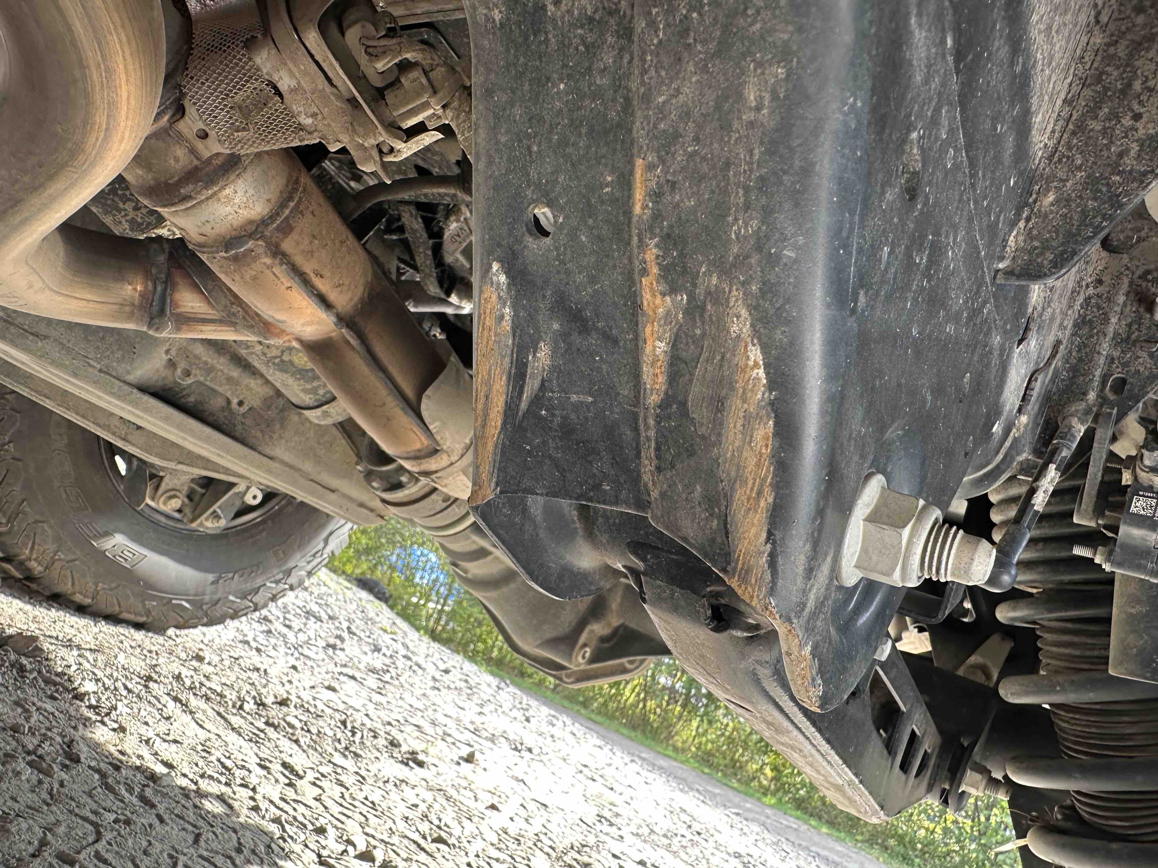 Trailing arm forward bracket dented rock crawling. - Bronco Nation